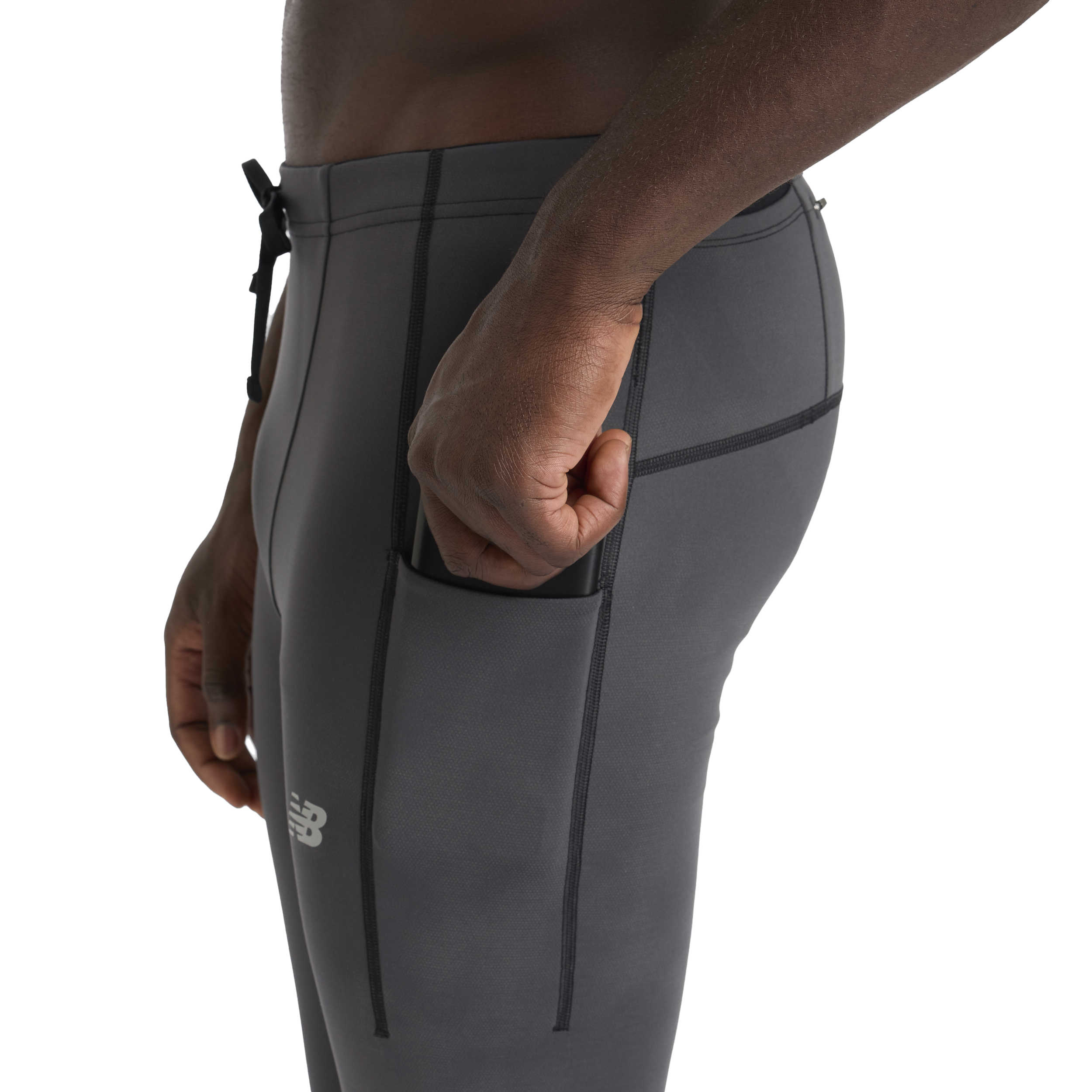 NEW BALANCE M Athletics Reflective Heat Pocket Tights sivustolla stadium.fi